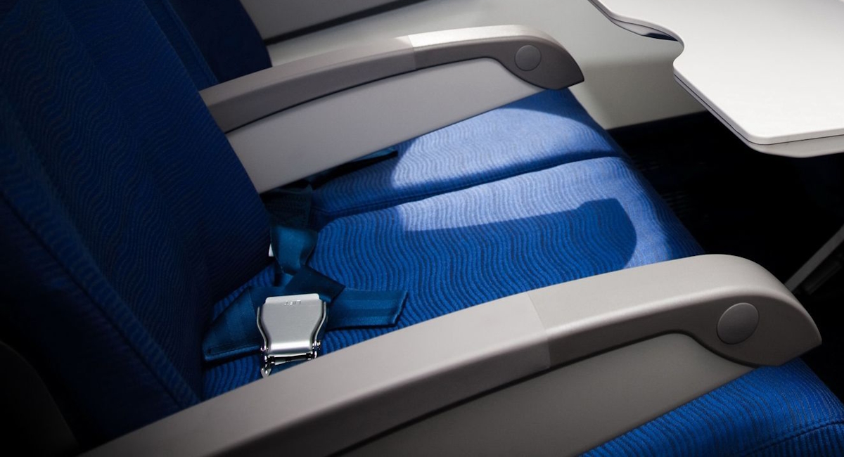 Tactile remote control in an airplane seat armrest. - Nanomade